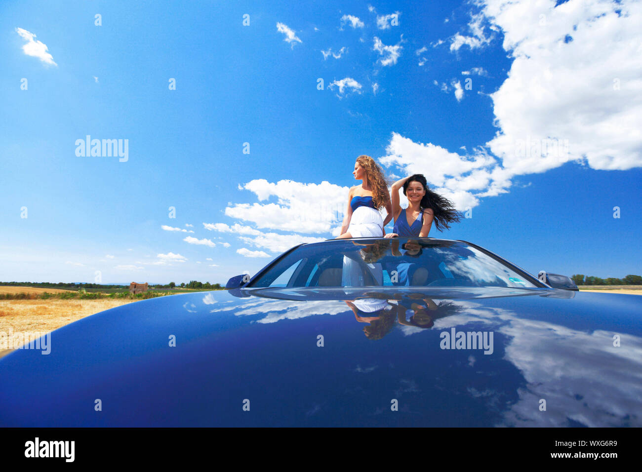 women dance in car Stock Photo - Alamy