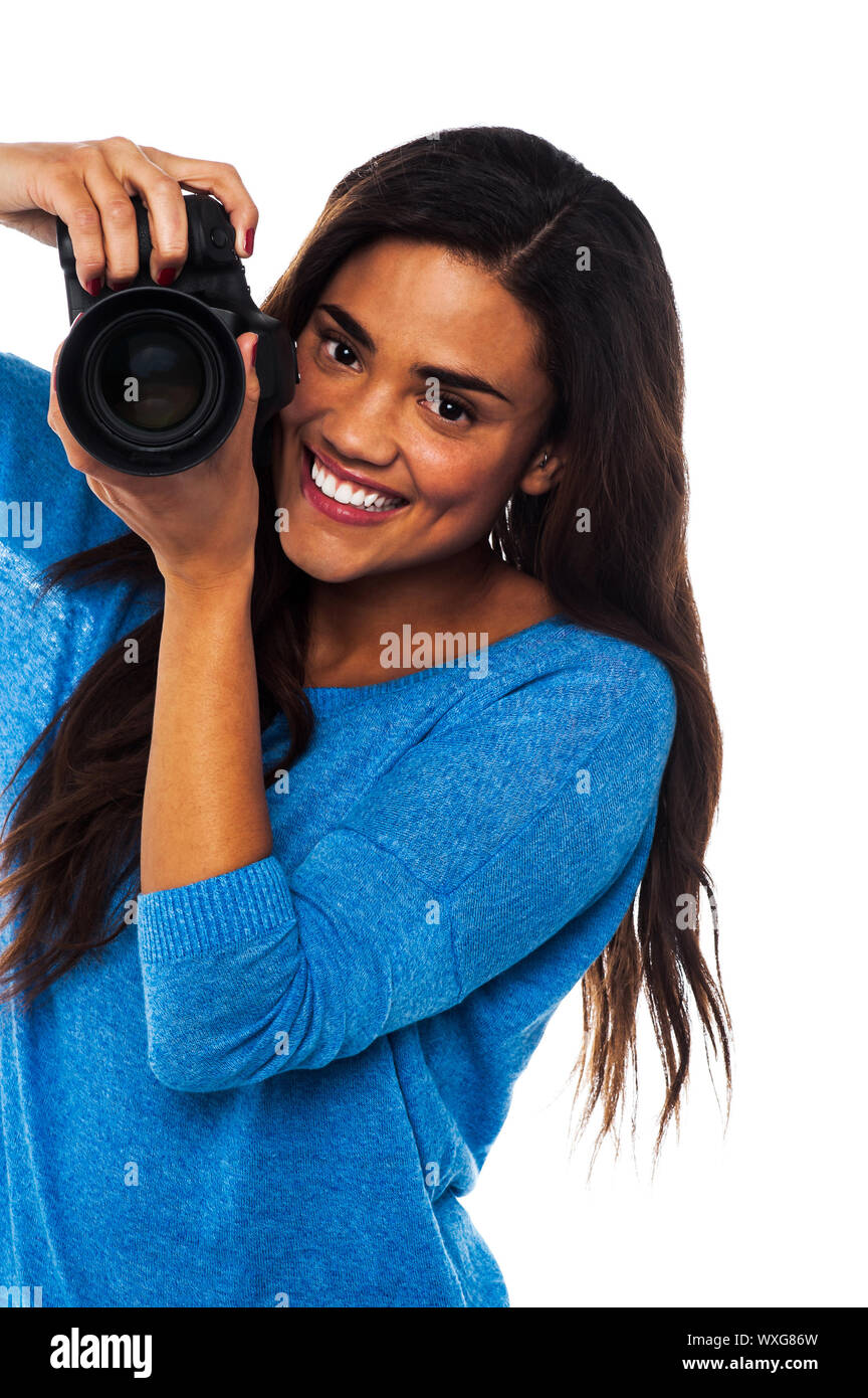 Young woman photographer taking a snap, smile please Stock Photo - Alamy