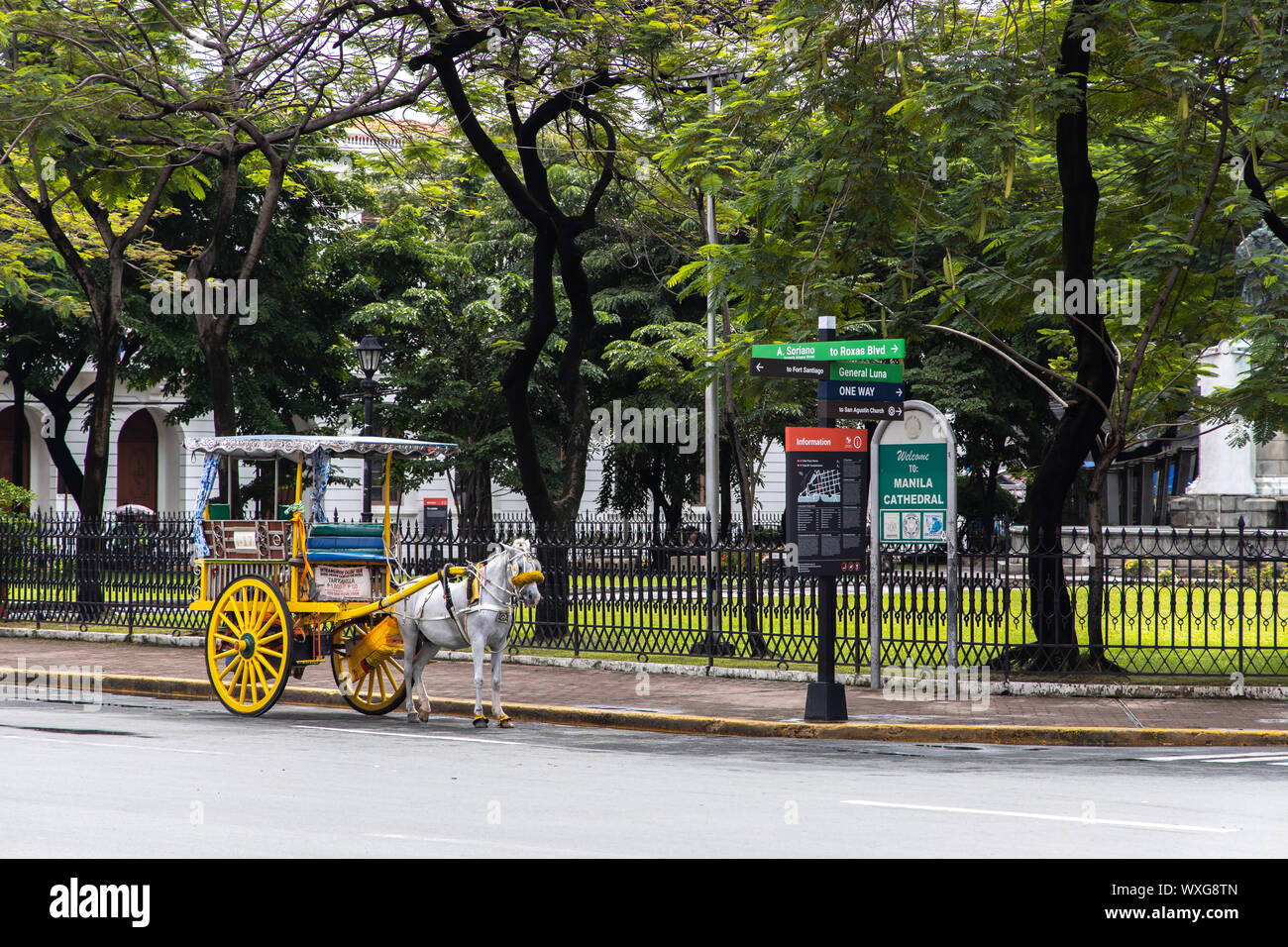 Kalesa waiting at the Intramuros street, Manila, Philippines Stock ...