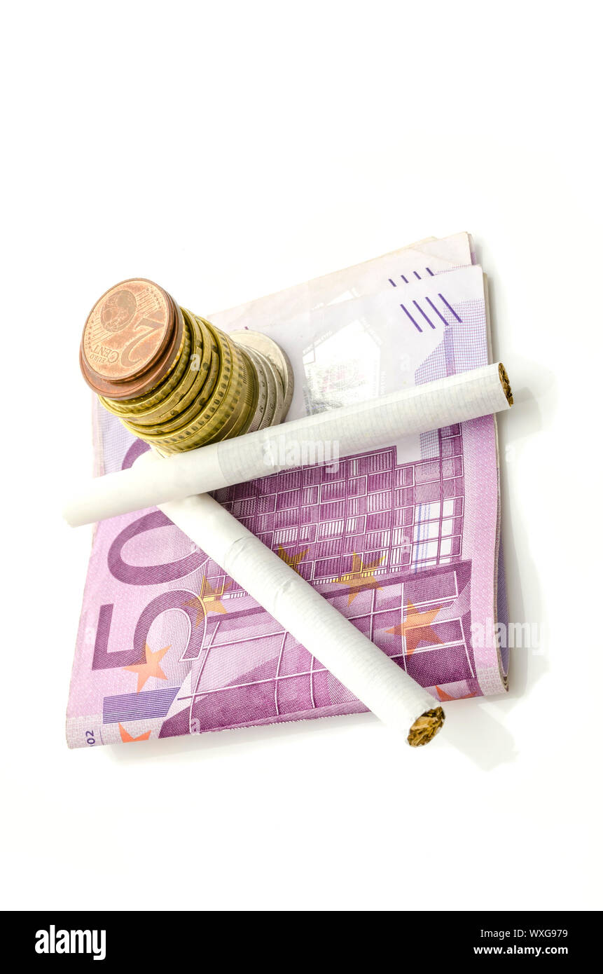 Euro money and cigarettes isolated over white background. Concept of ...