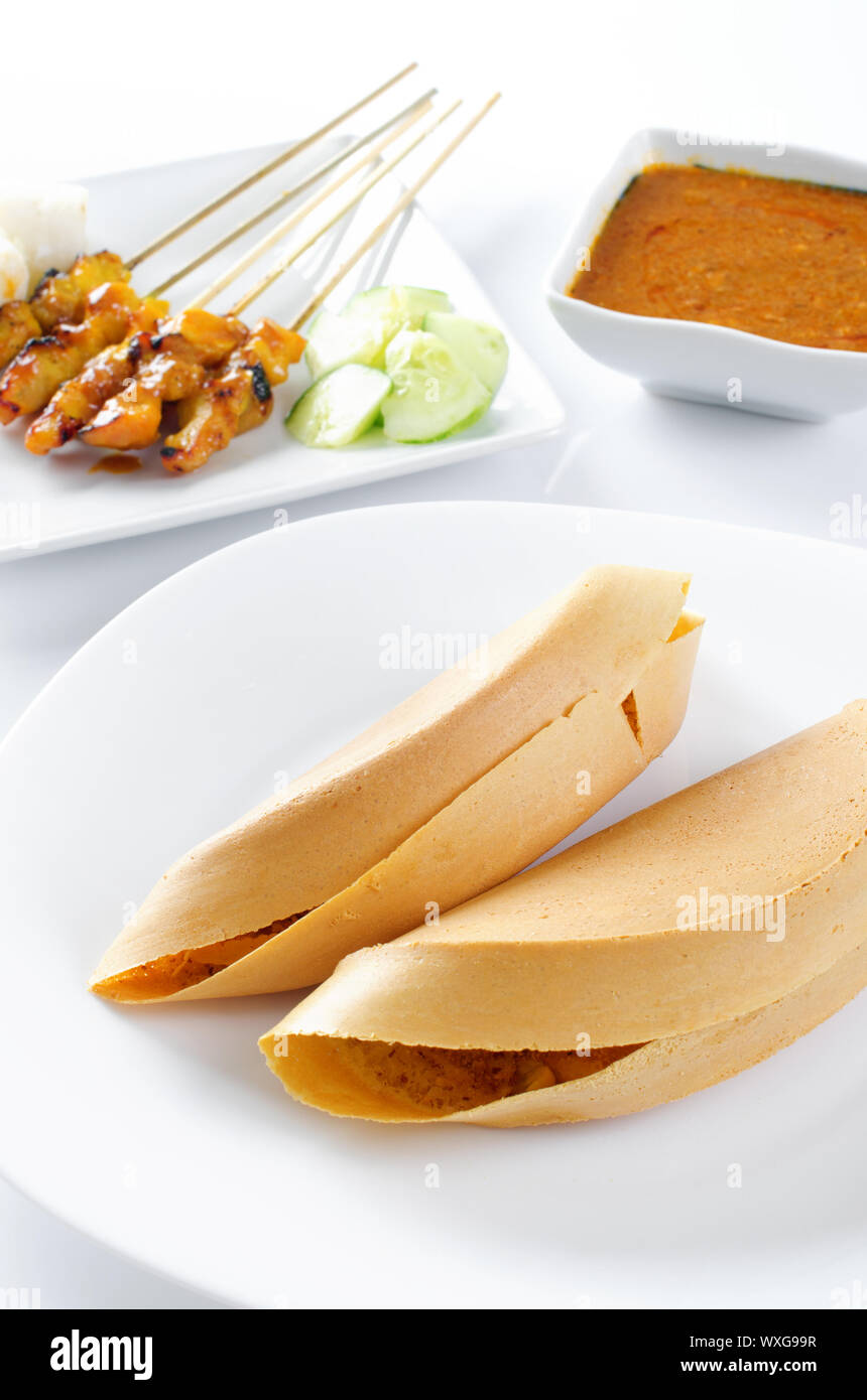 Apam balik, sweet crispy pancake filled with peanuts, sugar and sweet ...