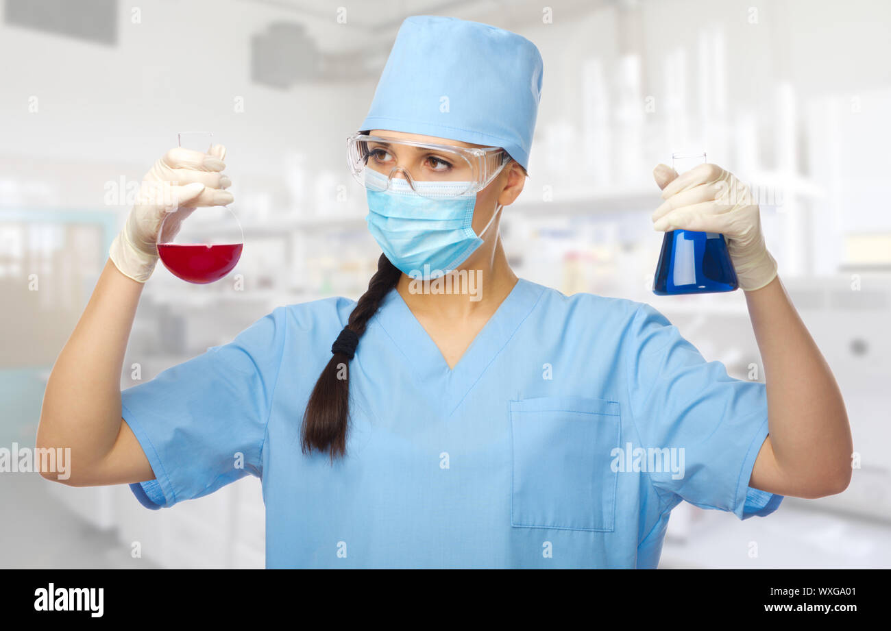 Female scientist with vials medicine hi-res stock photography and ...