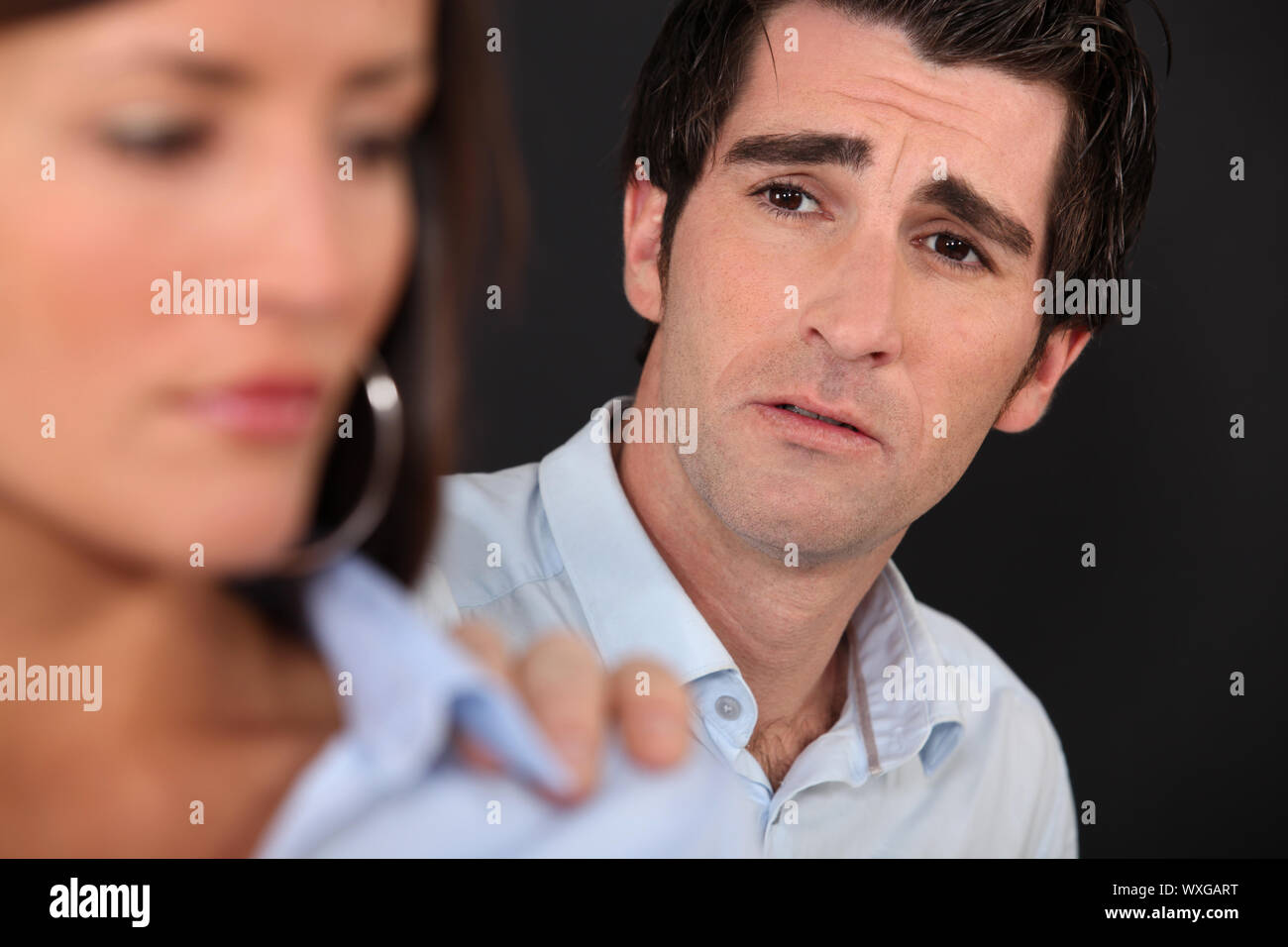 man trying to reconcile with girlfriend Stock Photo - Alamy