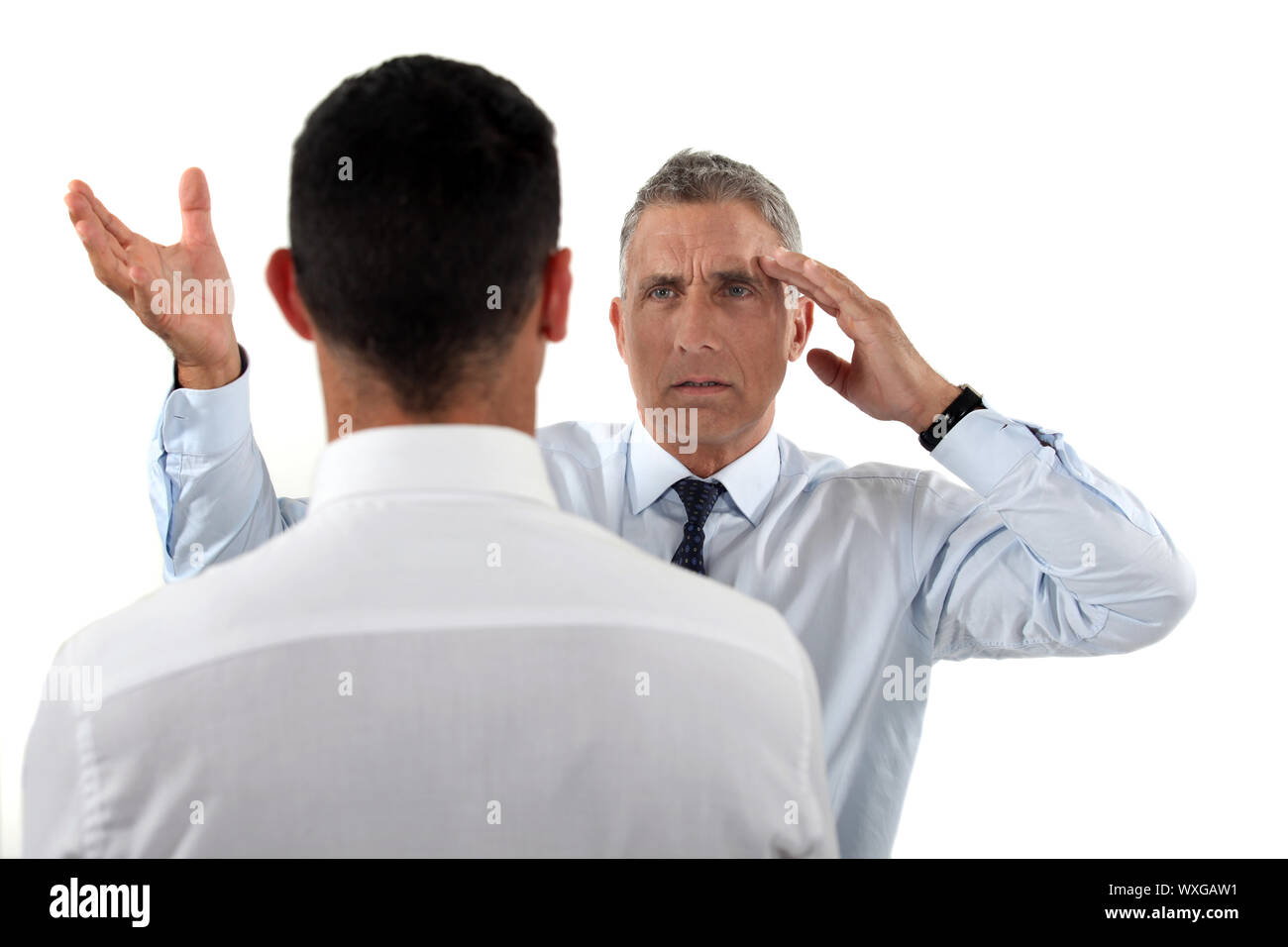 Boss angry at his employee Stock Photo - Alamy