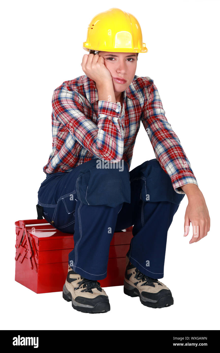 A depressed female construction worker Stock Photo - Alamy