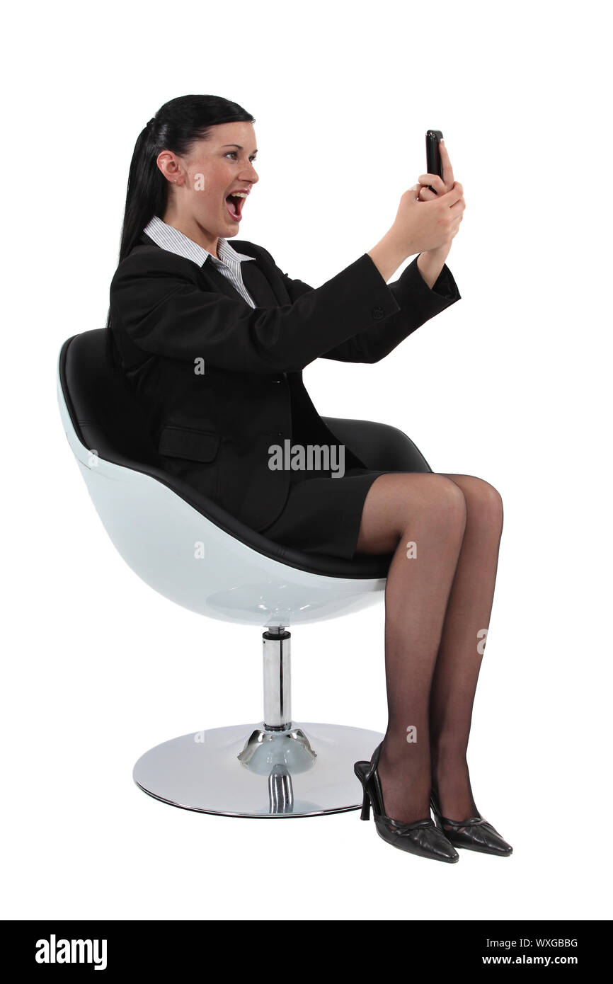 woman receiving a text message and laughing Stock Photo - Alamy