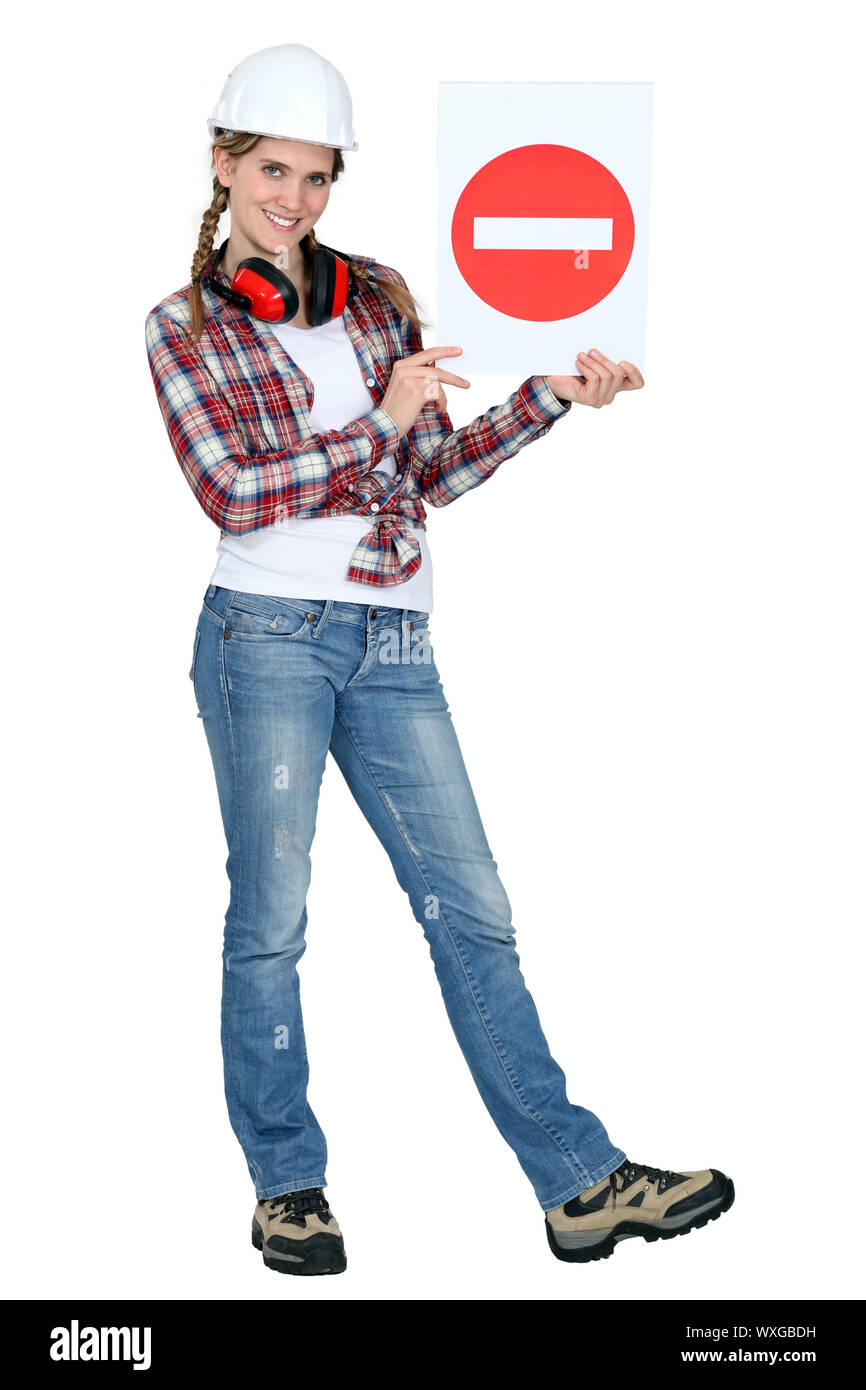 Female construction holding warning sign Cut Out Stock Images ...