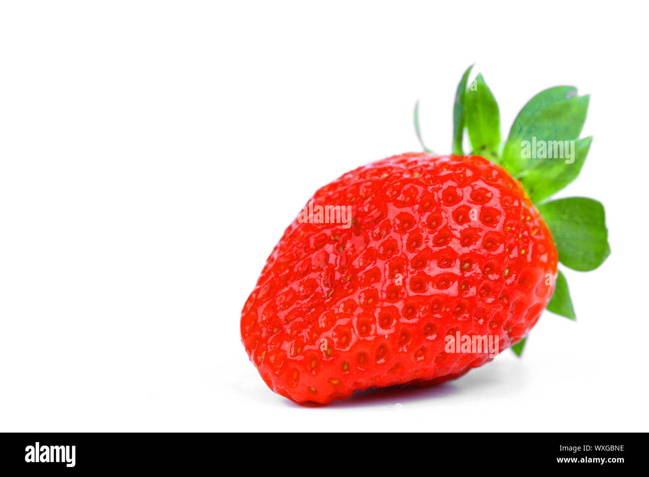 one strawberry isolated on white Stock Photo - Alamy