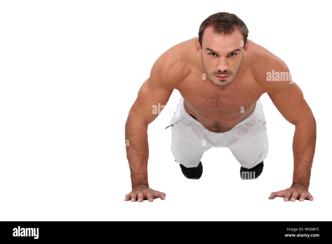 Man performing push-up Stock Photo - Alamy