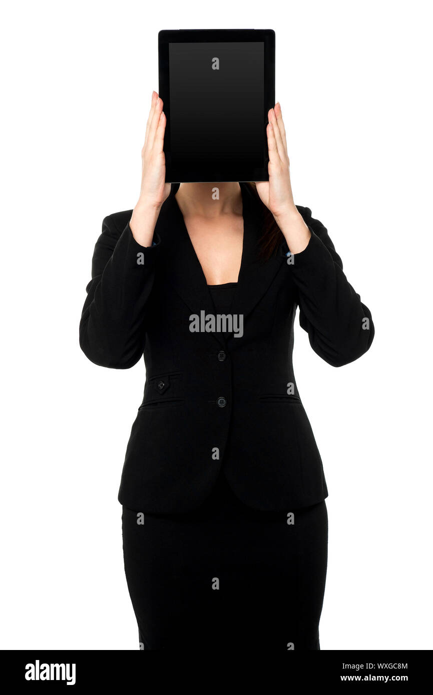Corporate lady hiding her face with tablet pc Stock Photo - Alamy