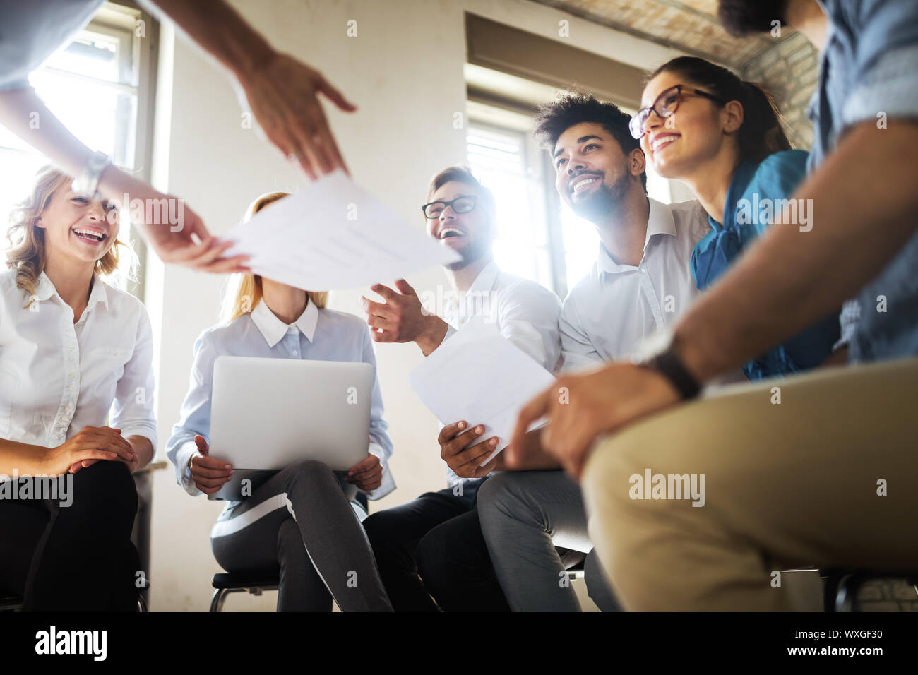 Happy creative team in office. Business, startup, design, people and ...