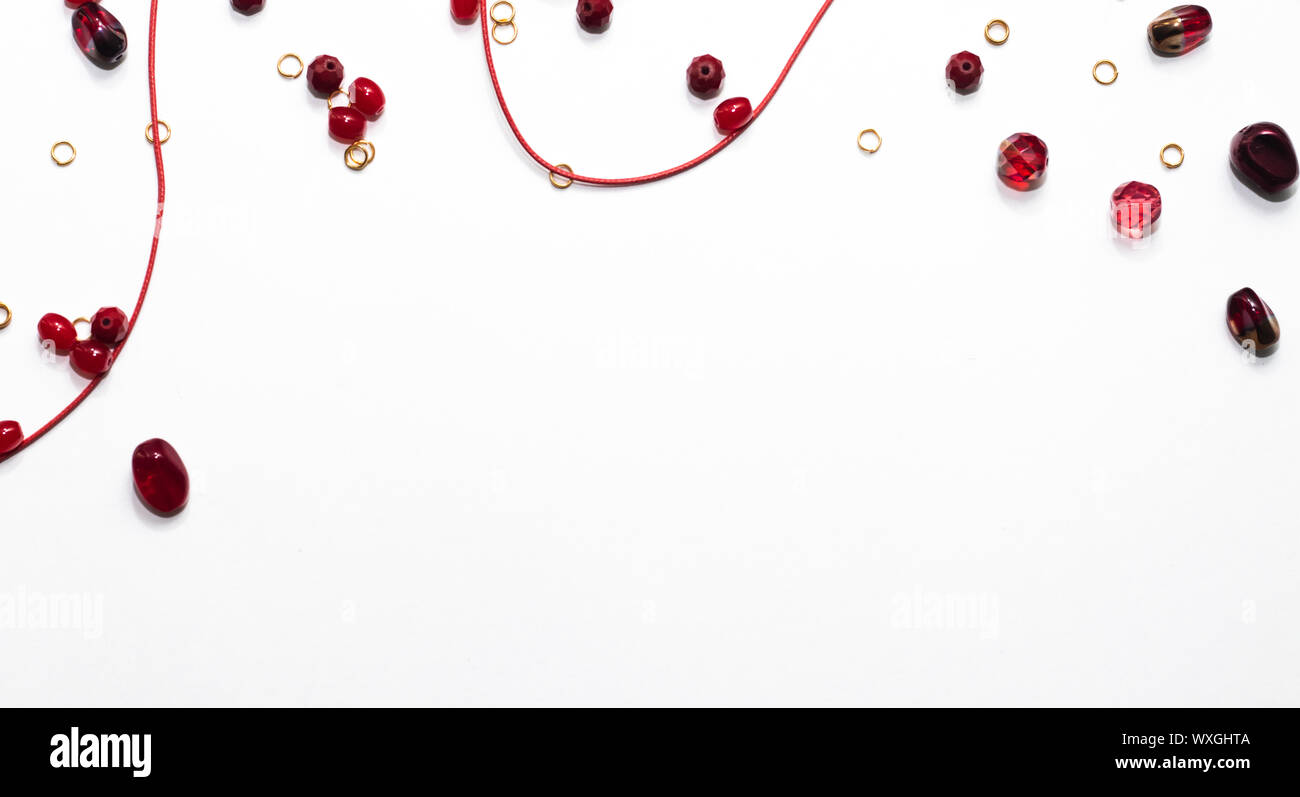 White background for workshops. Tools for jewelry making, colorful ...