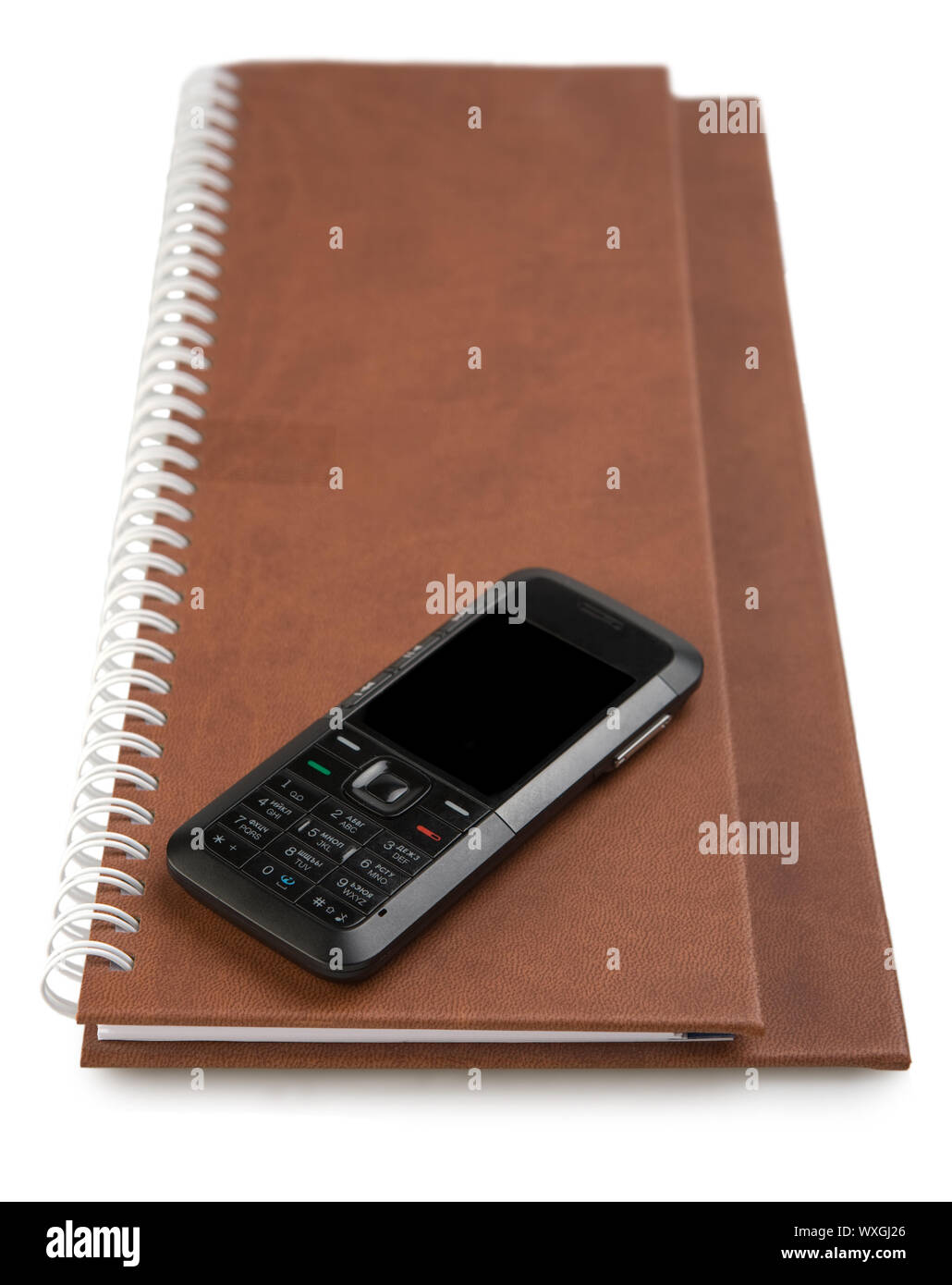 close up isolated on a white background Phone and notebook Stock Photo ...