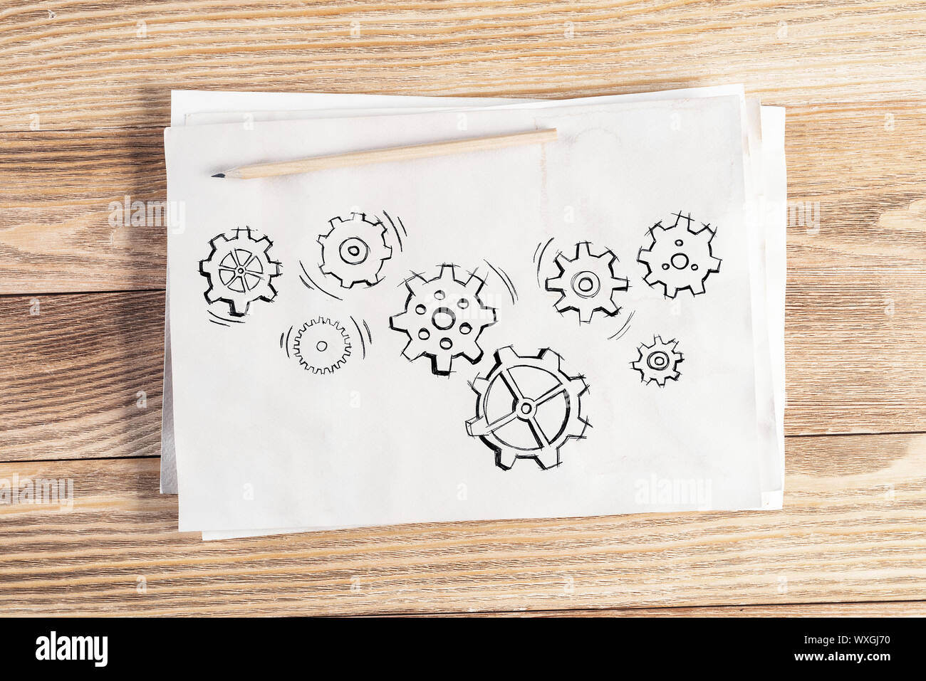 Group of rotating gears pencil hand drawn. Machine mechanism with ...