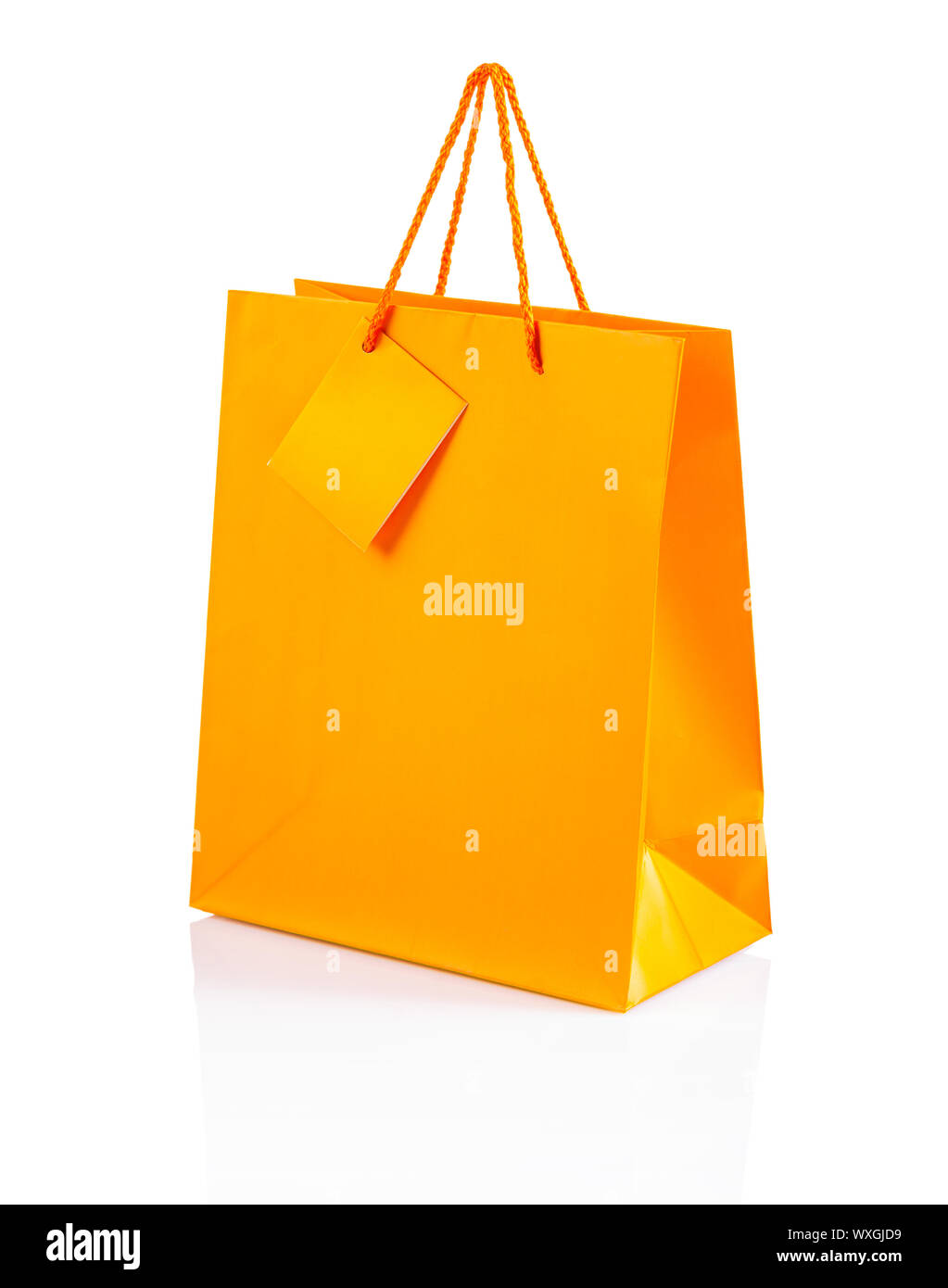 an orange color paper bag Stock Photo - Alamy