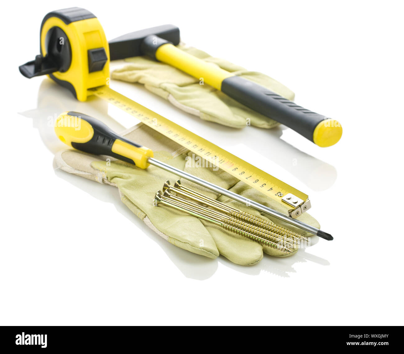 gloves with working tools Stock Photo - Alamy