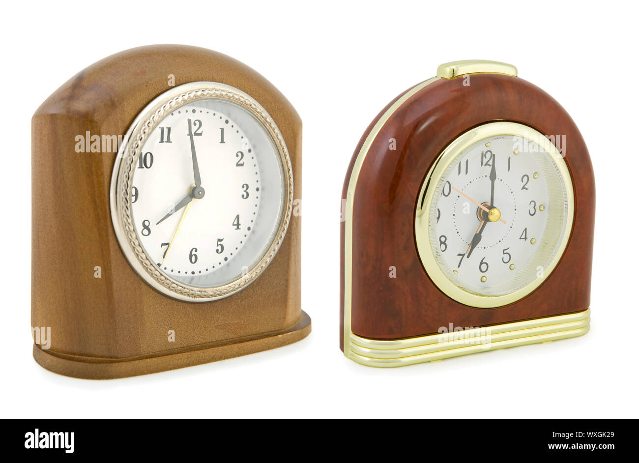 two clock isolated on a white background wood Stock Photo - Alamy