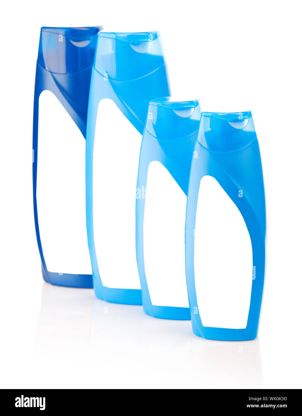 four blue shampoo bottle Stock Photo - Alamy