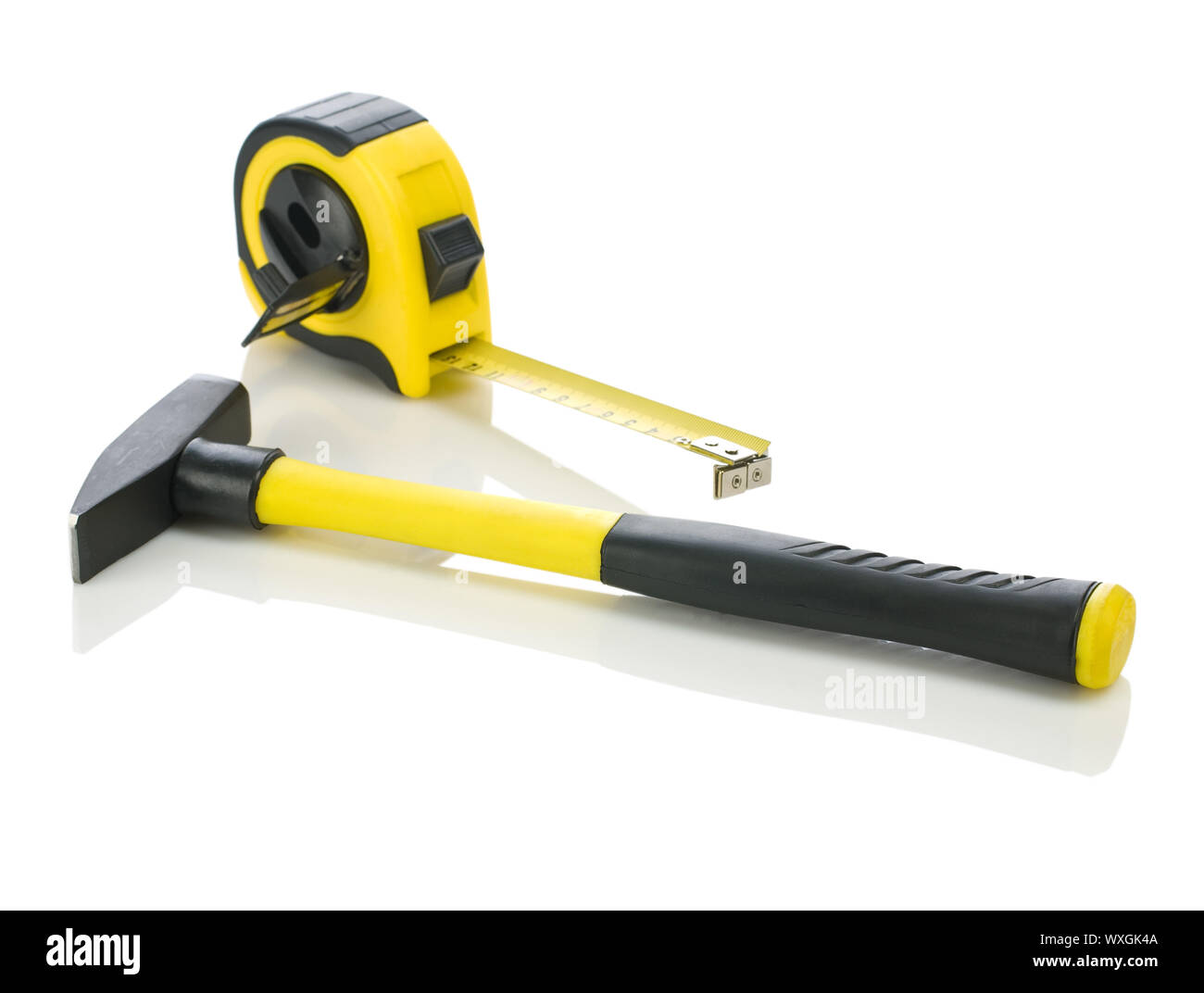 measuring tape and hammer isolated Stock Photo - Alamy