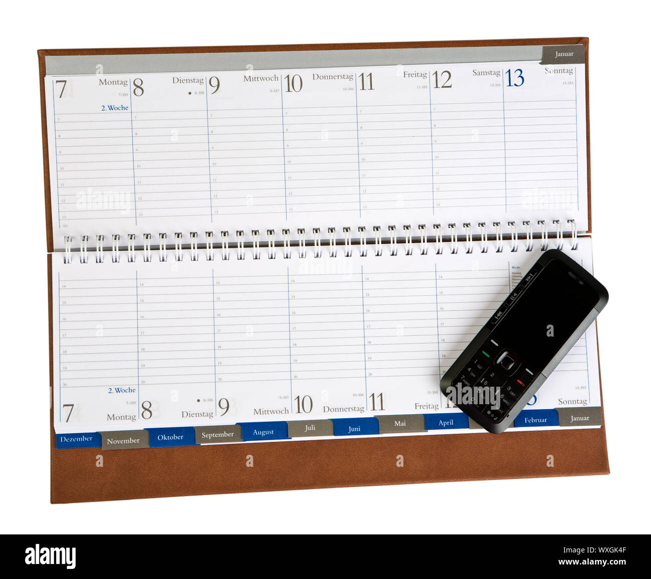 notebook with mobile phone isolated Stock Photo - Alamy