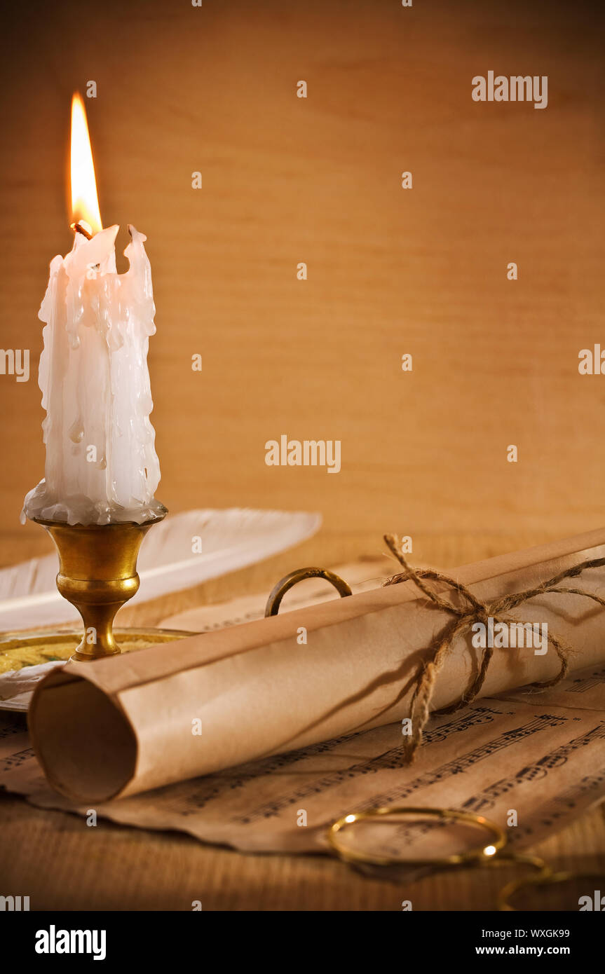 roll of old paper andle candle Stock Photo - Alamy
