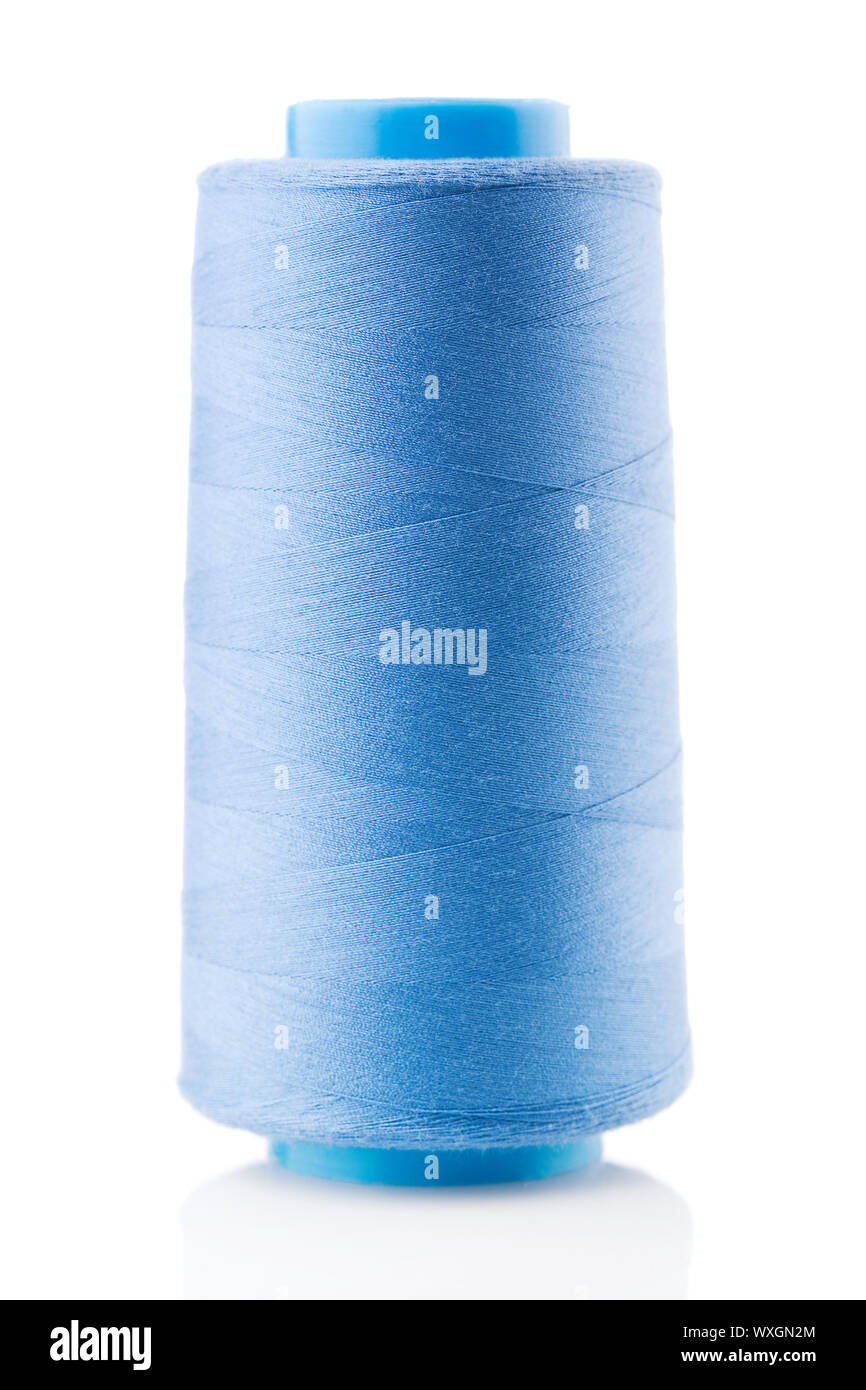 blue bobbin with string Stock Photo - Alamy