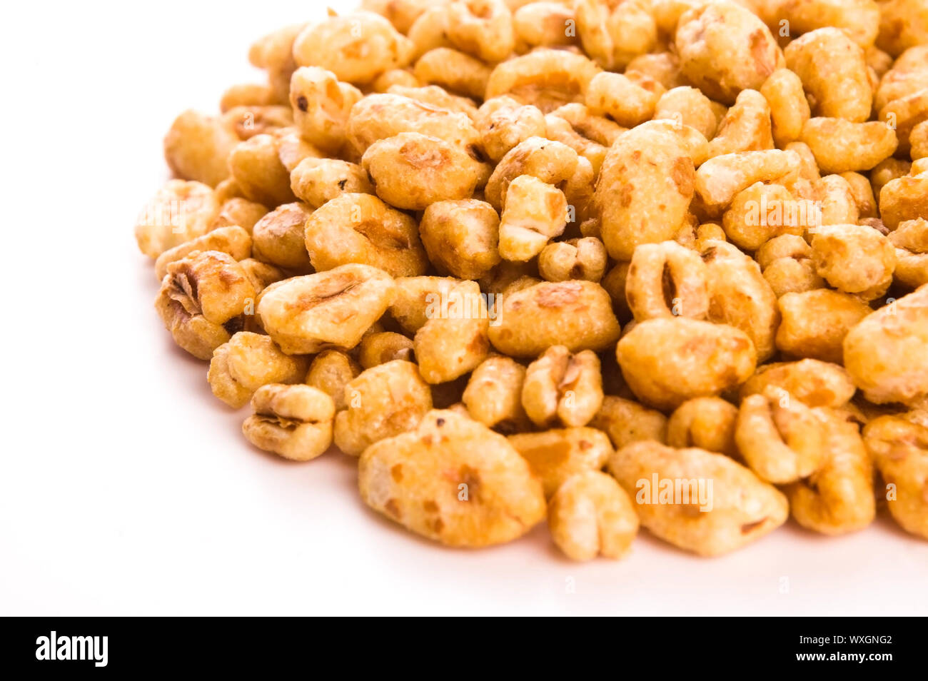 Popped wheat grains Stock Photo - Alamy