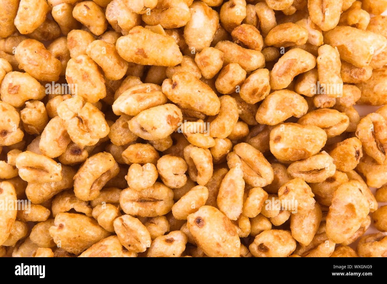 Popped wheat grains Stock Photo - Alamy