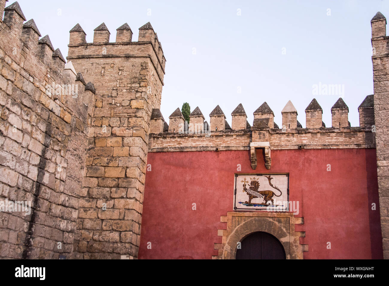The walls of a castle in the city of Seville, Spain Stock Photo - Alamy