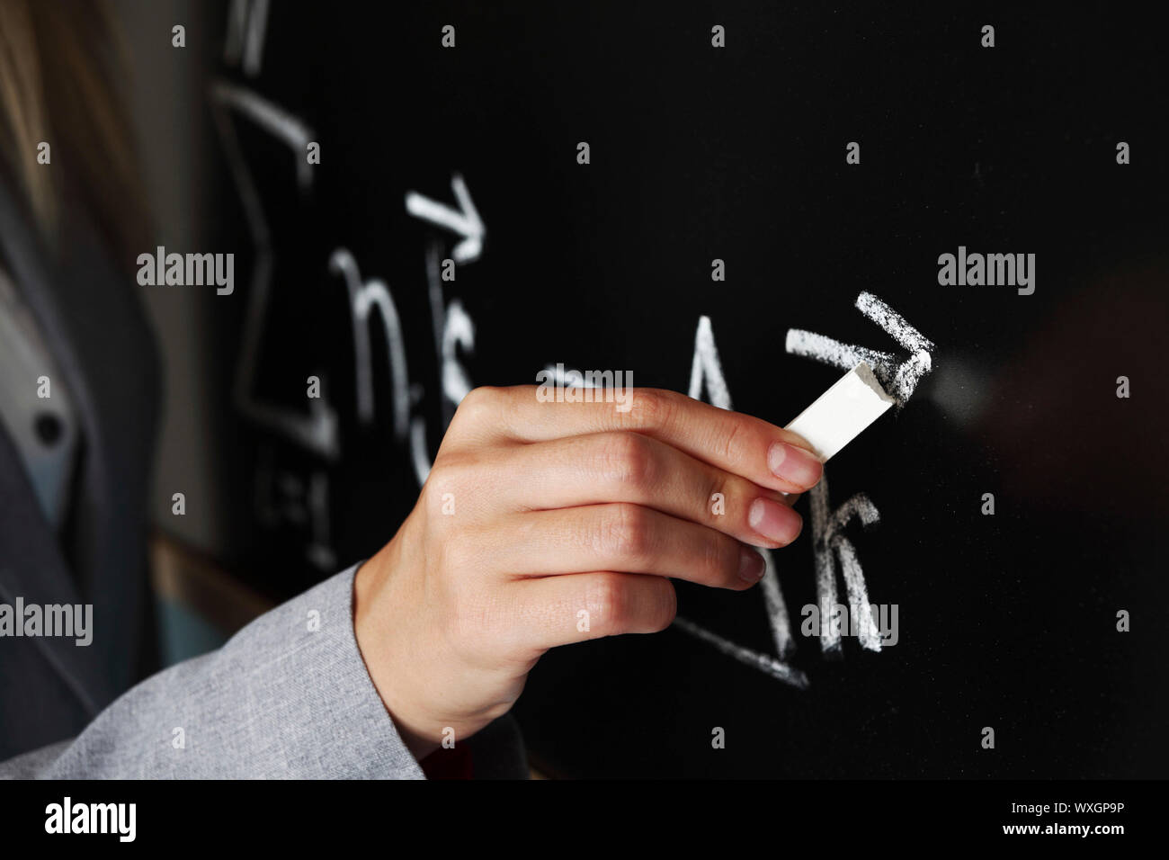 teacher draw condition of phase synchronism Stock Photo - Alamy