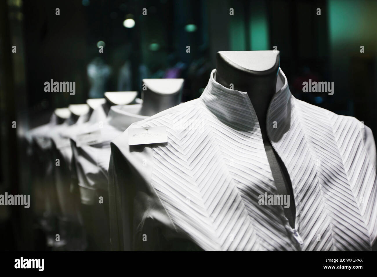 showcase with white clothes Stock Photo - Alamy