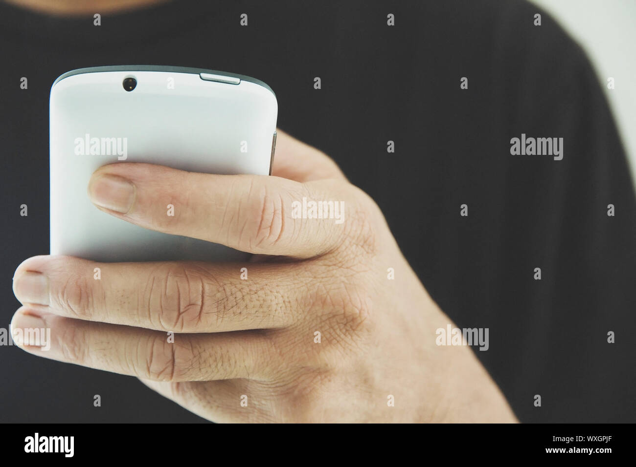 man checking his phone Stock Photo - Alamy
