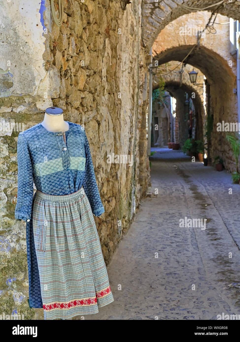Narrow alley at the medieval castle village of Mesta in Chios island ...