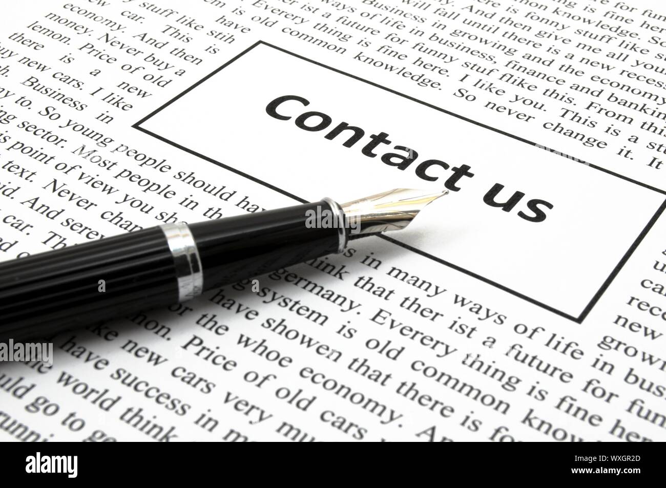 contact us concept with newspaper showing business communication Stock ...