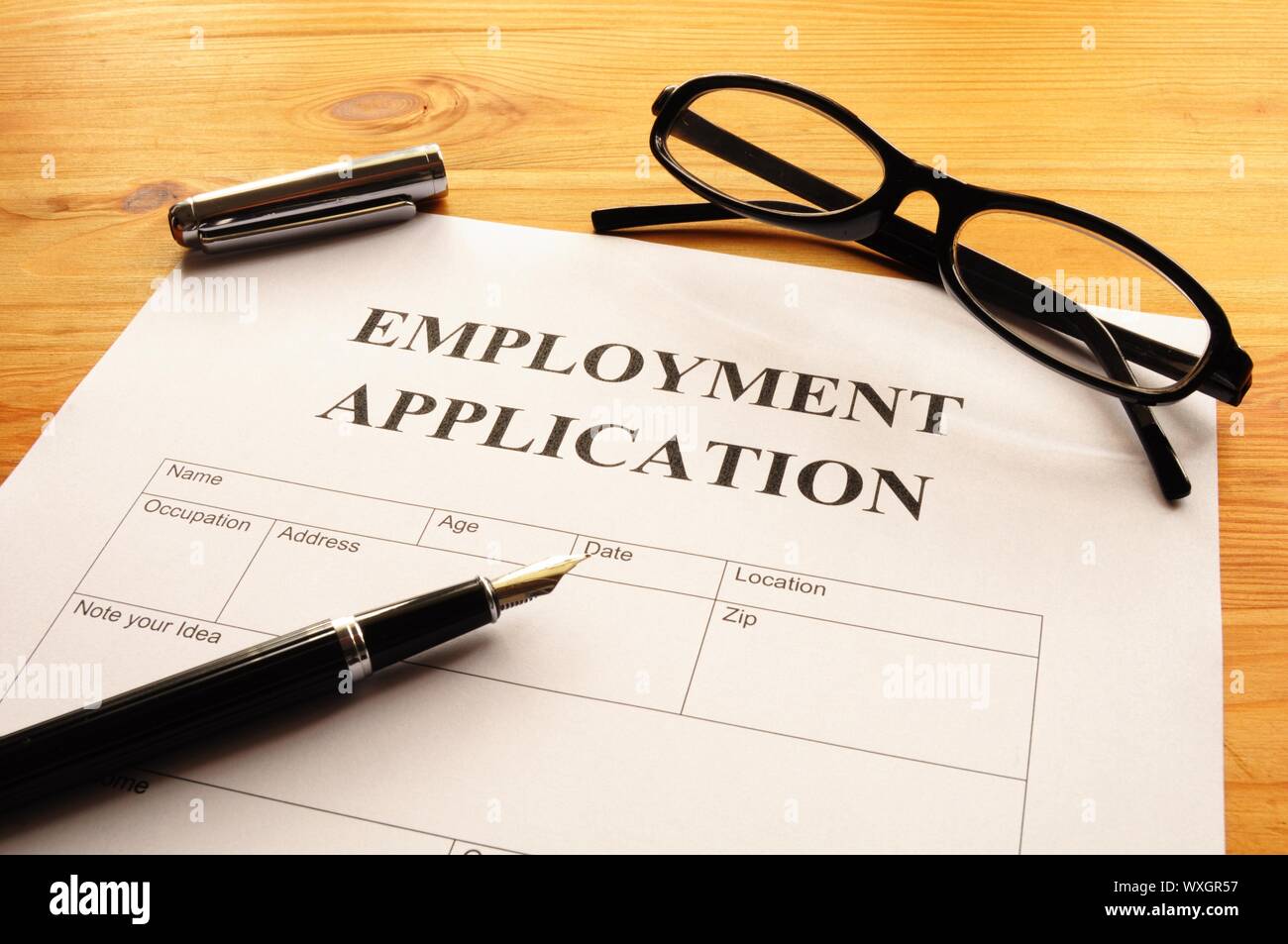 employment application form on desk showing job search concept Stock ...
