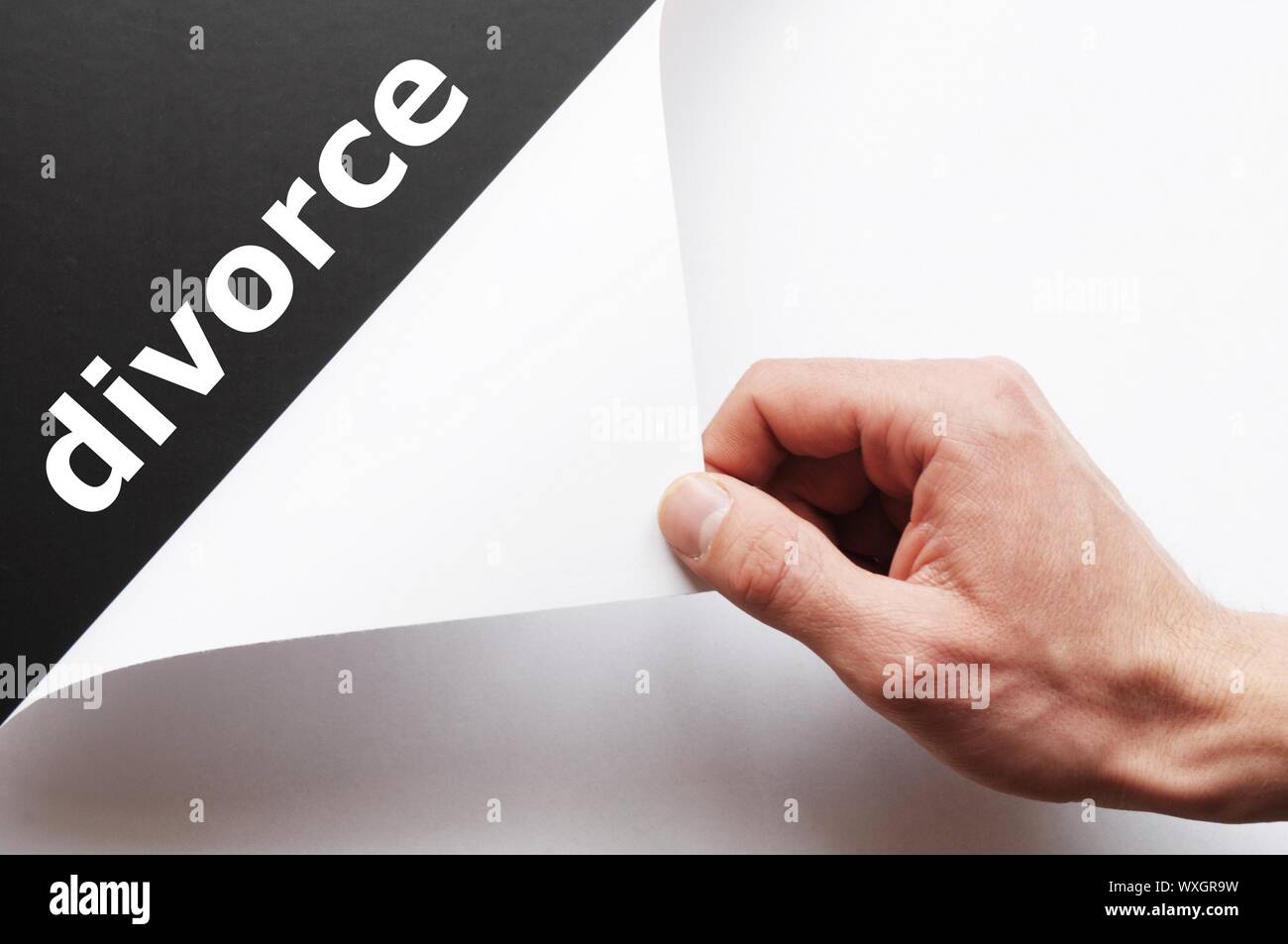 divorce concept with hand holding paper sign Stock Photo - Alamy