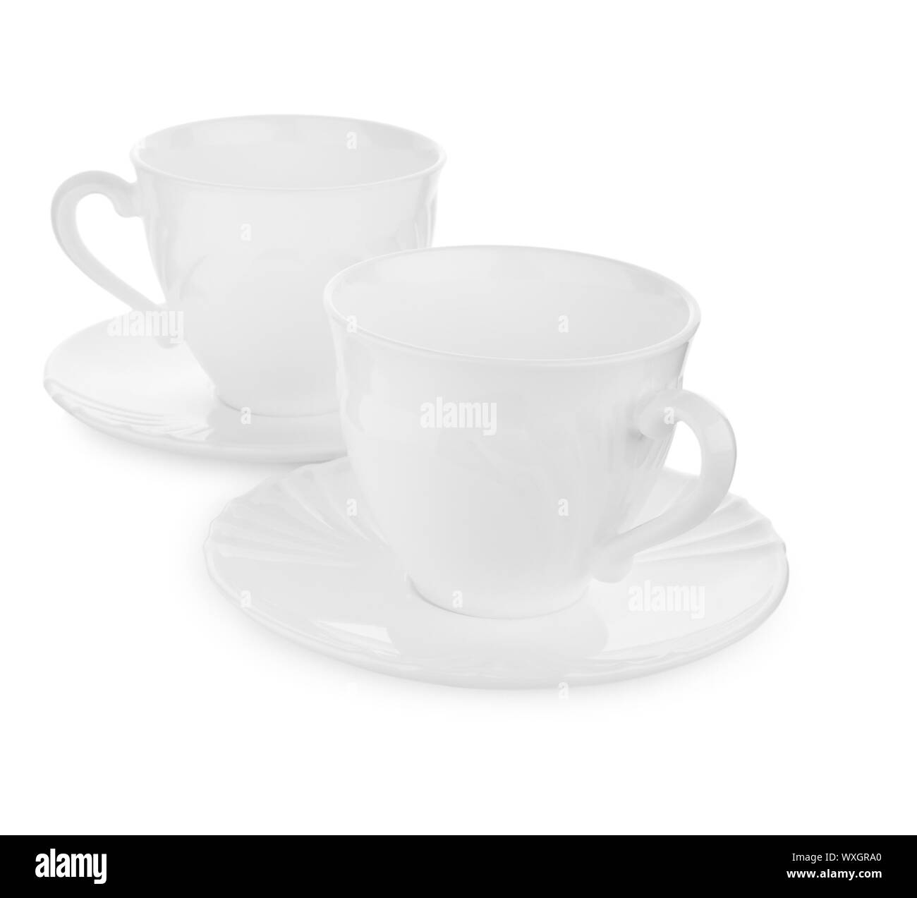 two cups on a plate isolated Stock Photo - Alamy
