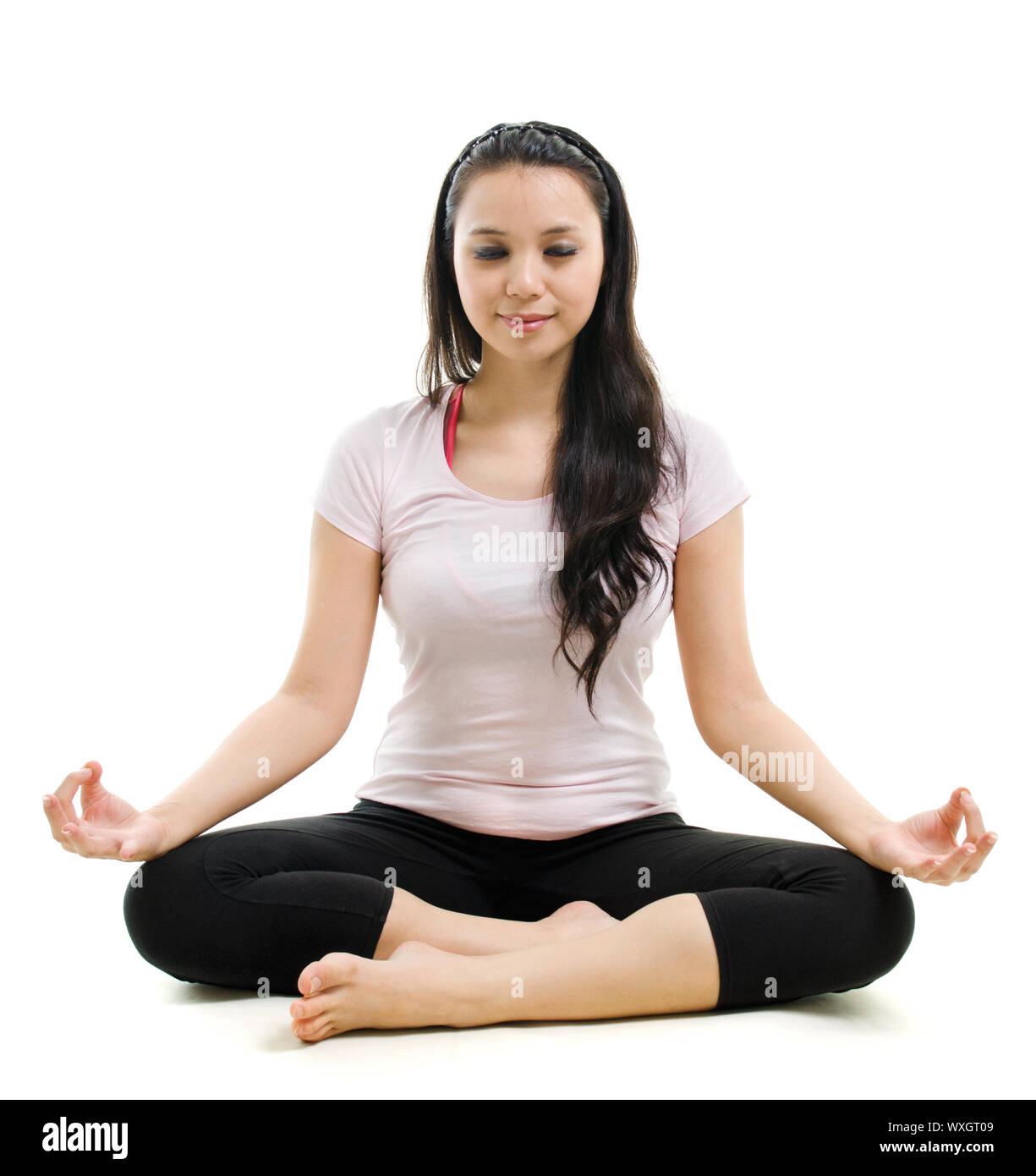 Beautiful sport Yoga girl in lotus pose. Full length isolated on white background. Mixed race ...