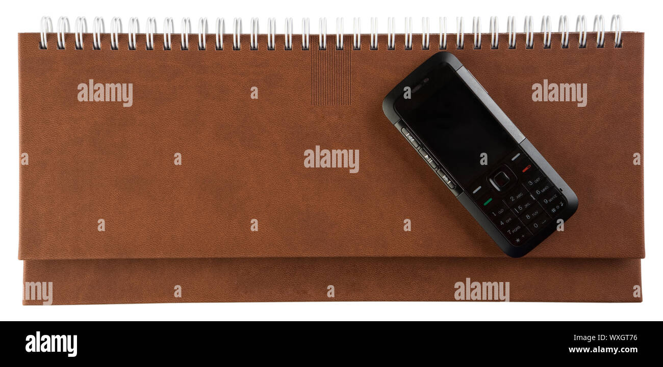 notepad and mobile phone Stock Photo - Alamy