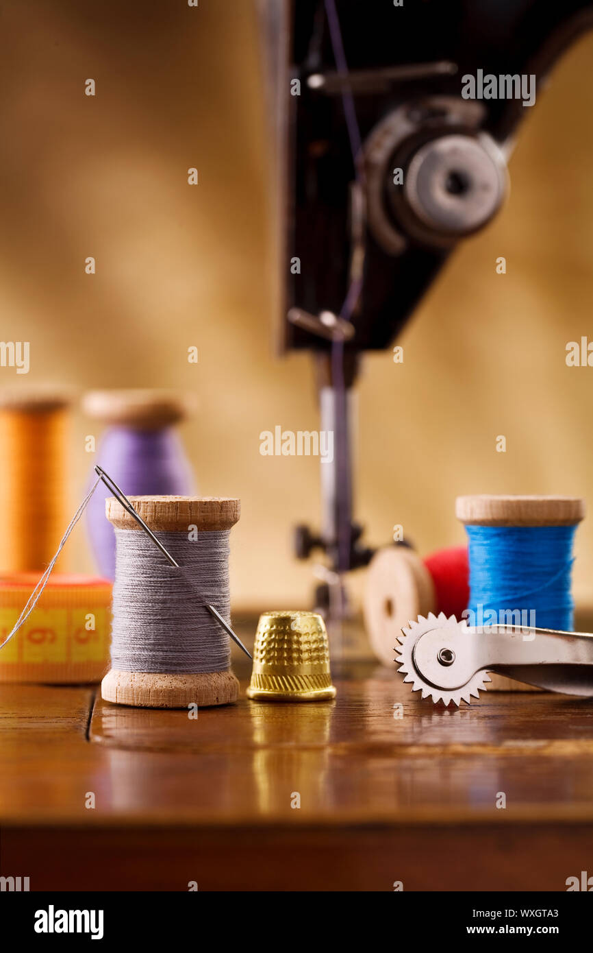 small sewing wooden bobbin with other items Stock Photo - Alamy