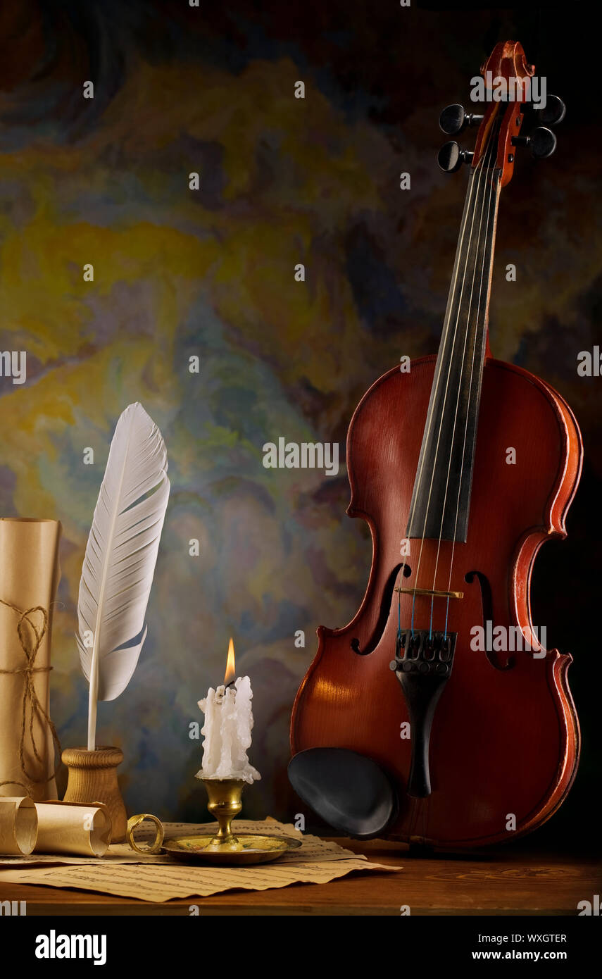 composition of violin and antique items Stock Photo - Alamy