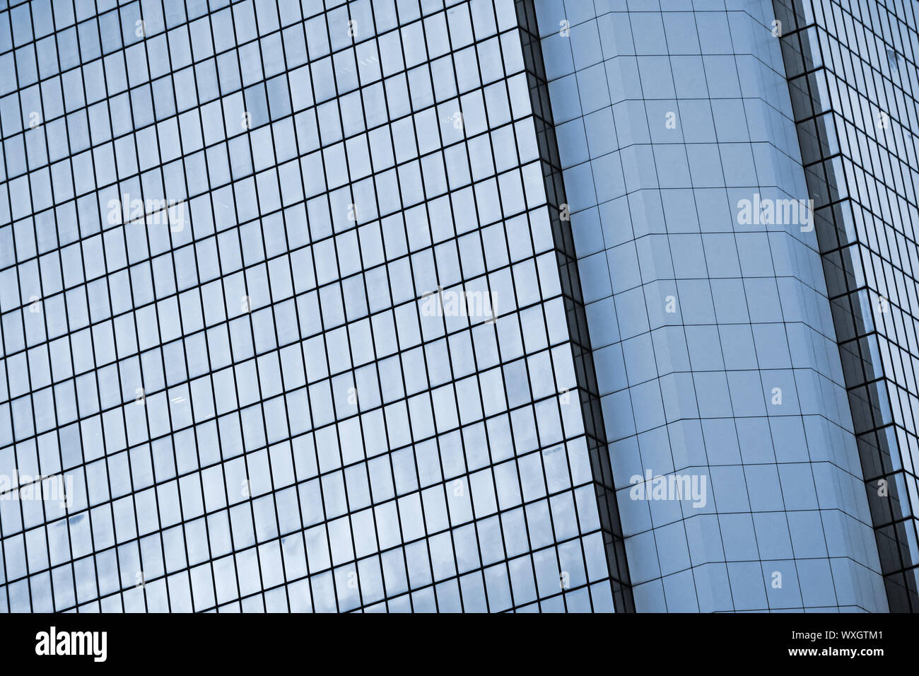 Modern skyscraper exterior with glass and reflection in daytime Stock ...