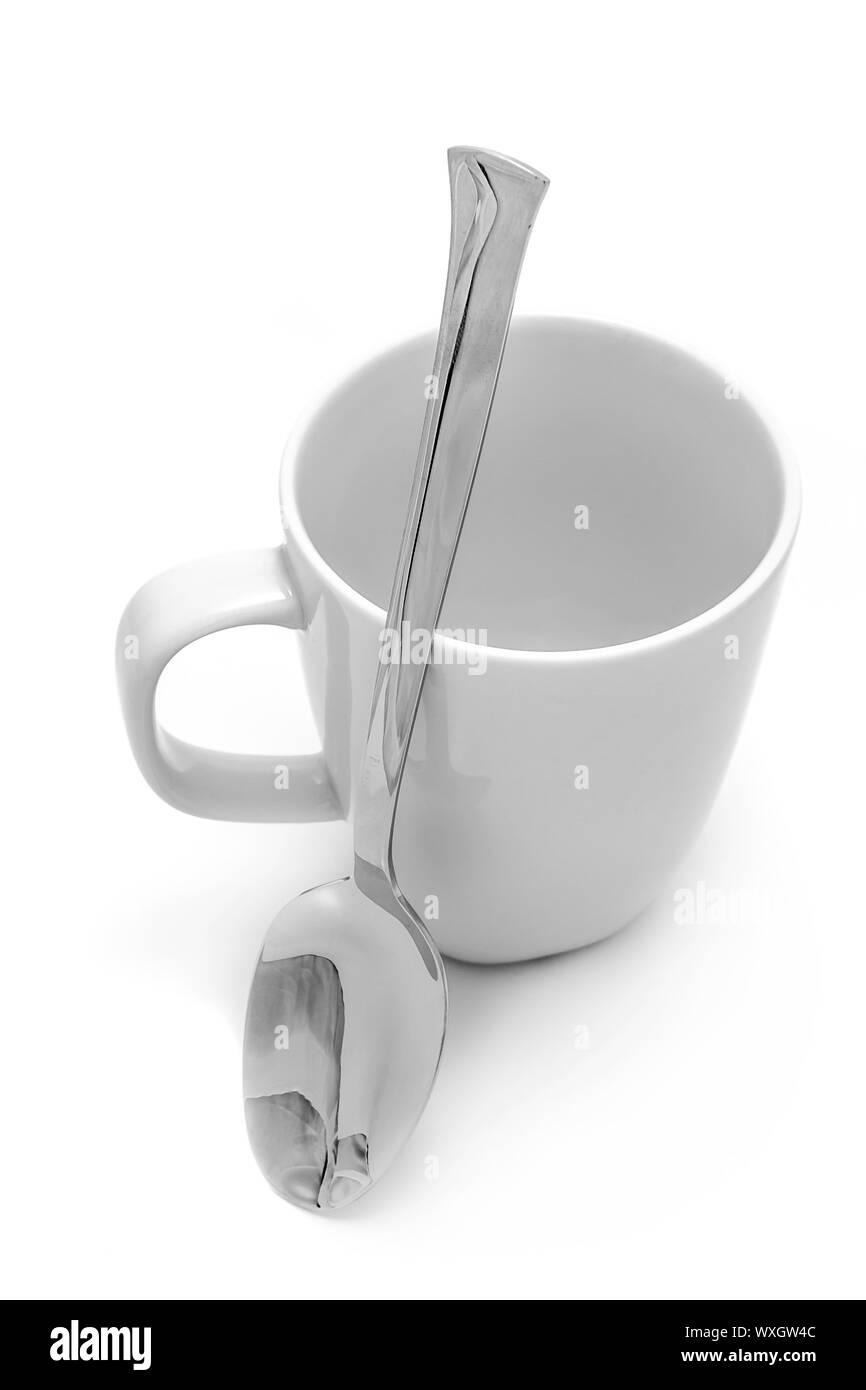 Mug and spoon Stock Photo - Alamy
