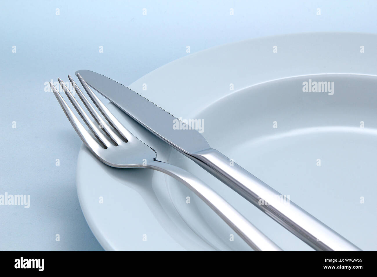 Diner cutlery background Stock Photo - Alamy