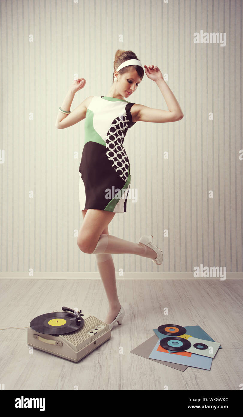 Young woman dancing at home, 1960 style Stock Photo - Alamy