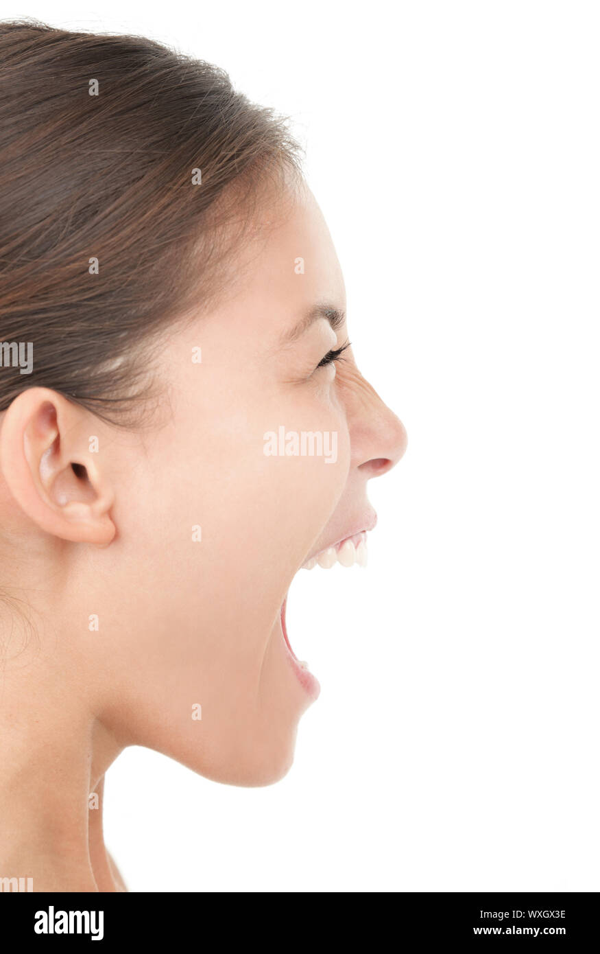 Screaming woman isolated portrait in profile. Cutout on white Stock ...