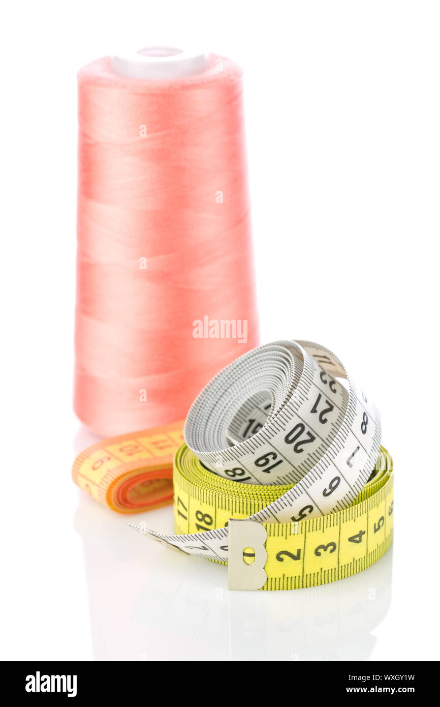 measure tapes and thread Stock Photo - Alamy