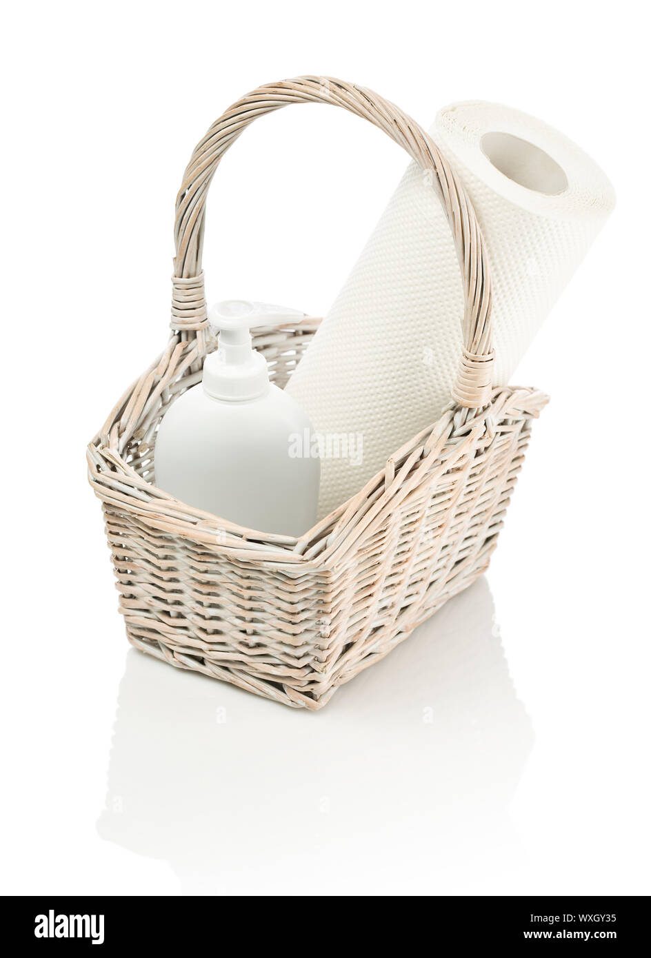 paper towel and bottle in basket Stock Photo - Alamy