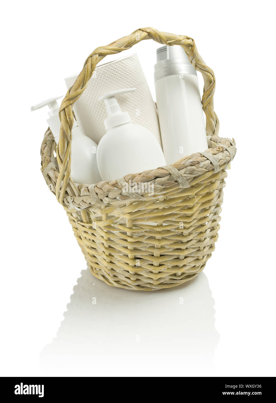 paper towel and bottles in basket Stock Photo - Alamy