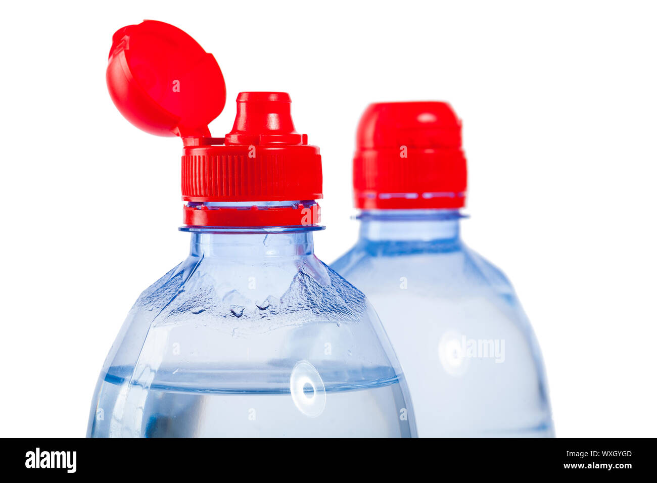 two tops of bottles with water Stock Photo - Alamy
